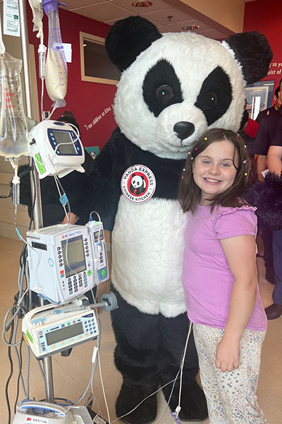 Panda Express team members celebrate teen lounge at Providence Sacred ...